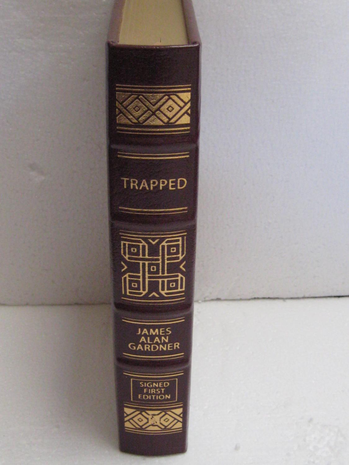 TRAPPED by Gardner, James Alan: Fine Full-Leather (2002) First Edition ...