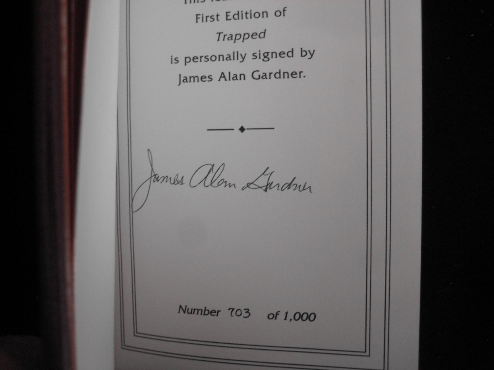 TRAPPED by Gardner, James Alan: Fine Full-Leather (2002) First Edition ...