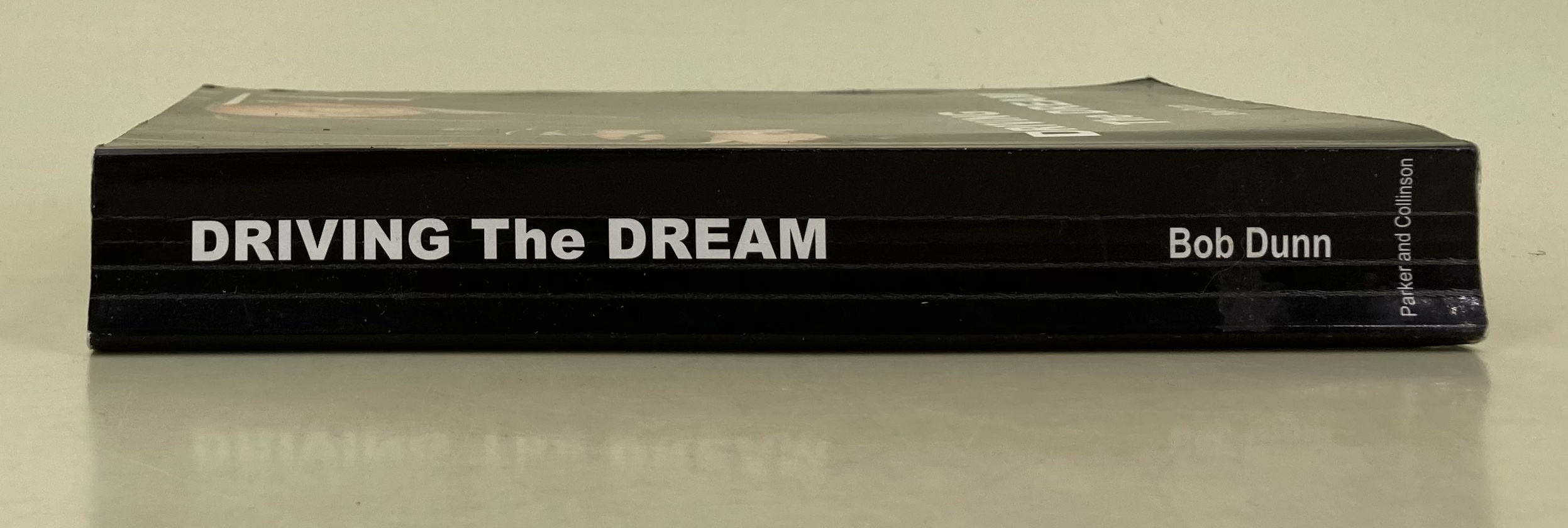Driving the Dream by Dunn, Bob: Near Fine Soft cover (2009) 1st Edition ...
