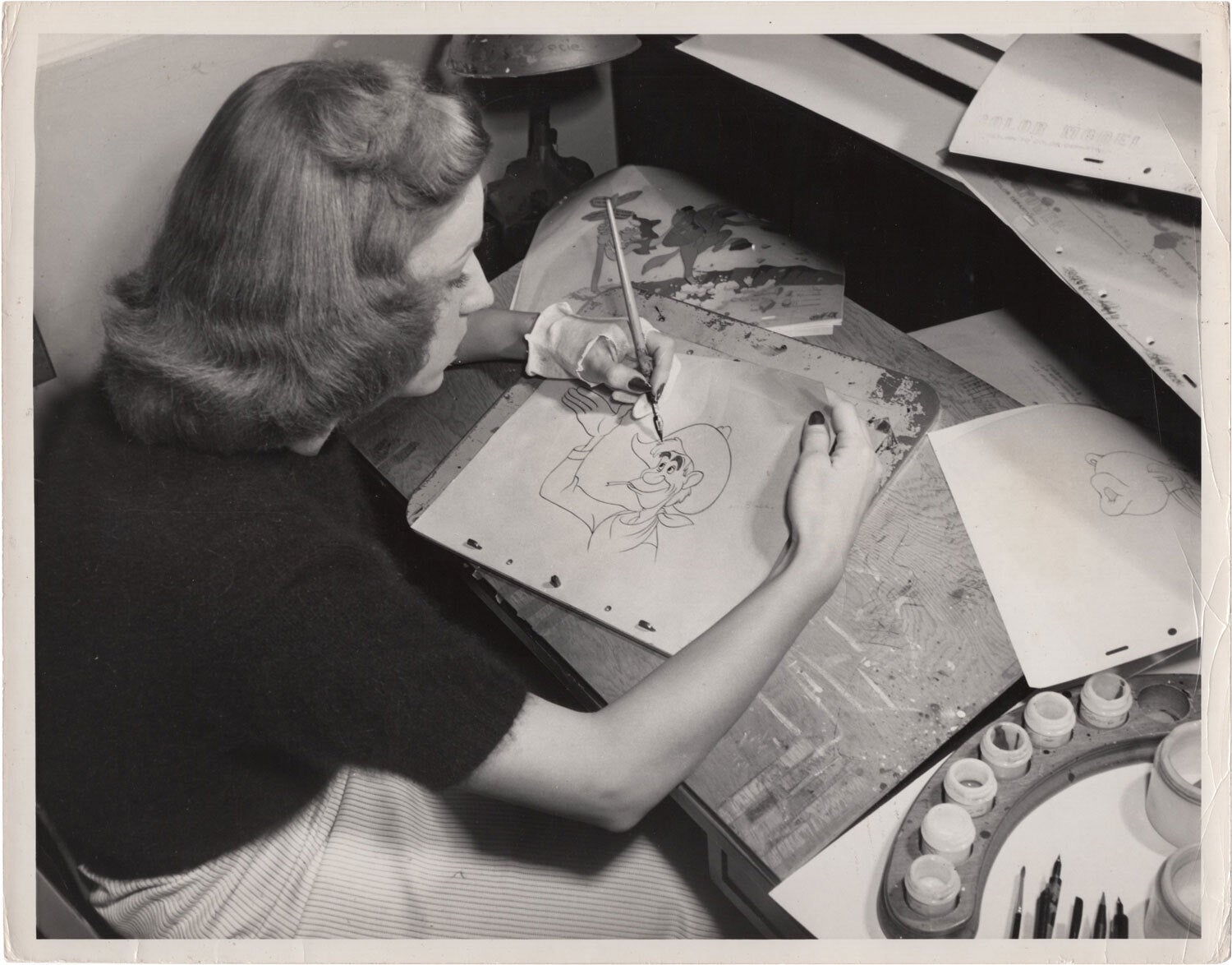 Melody Time (Original photograph of a Disney animator working on a cel ...