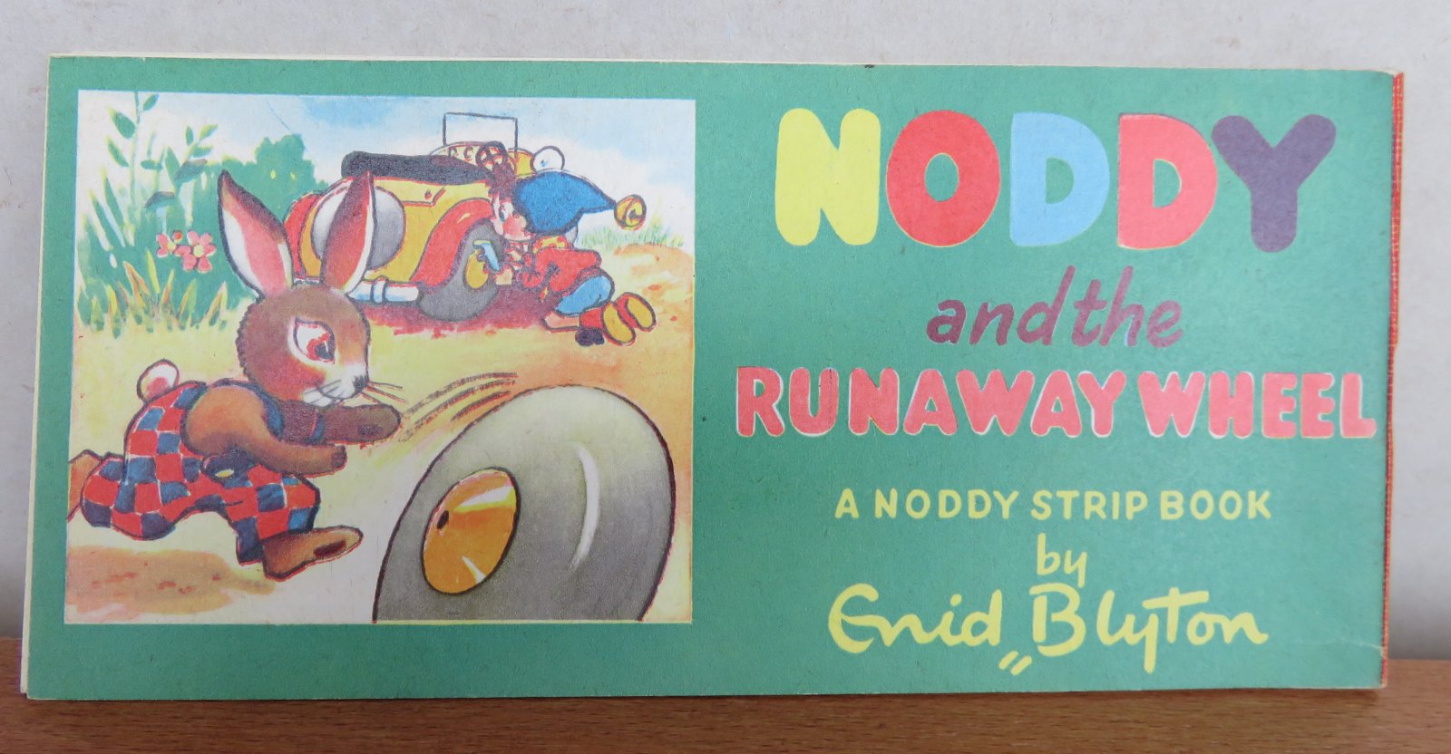 NODDY AND THE RUNAWAY WHEEL. by BLYTON, ENID. Noddy Strip Book No. 15 ...