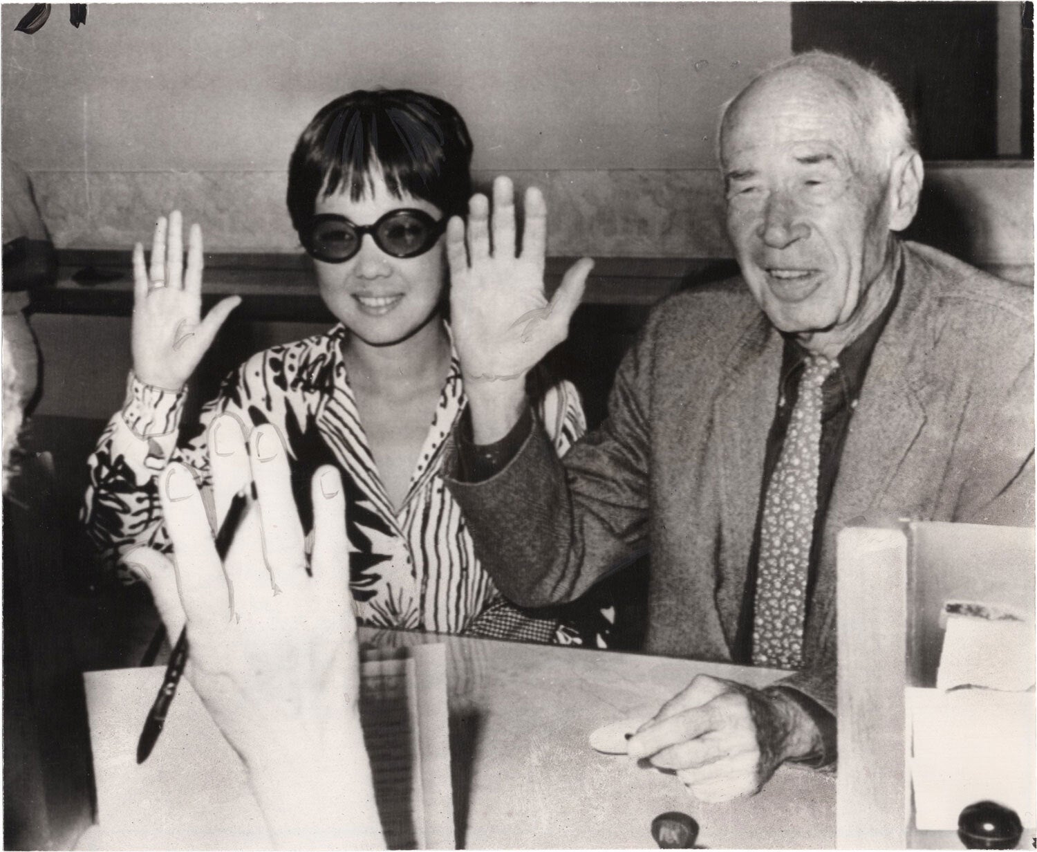 Original photograph of Henry Miller and Hoki Tokuda applying for a marriage license, 1963 von ...