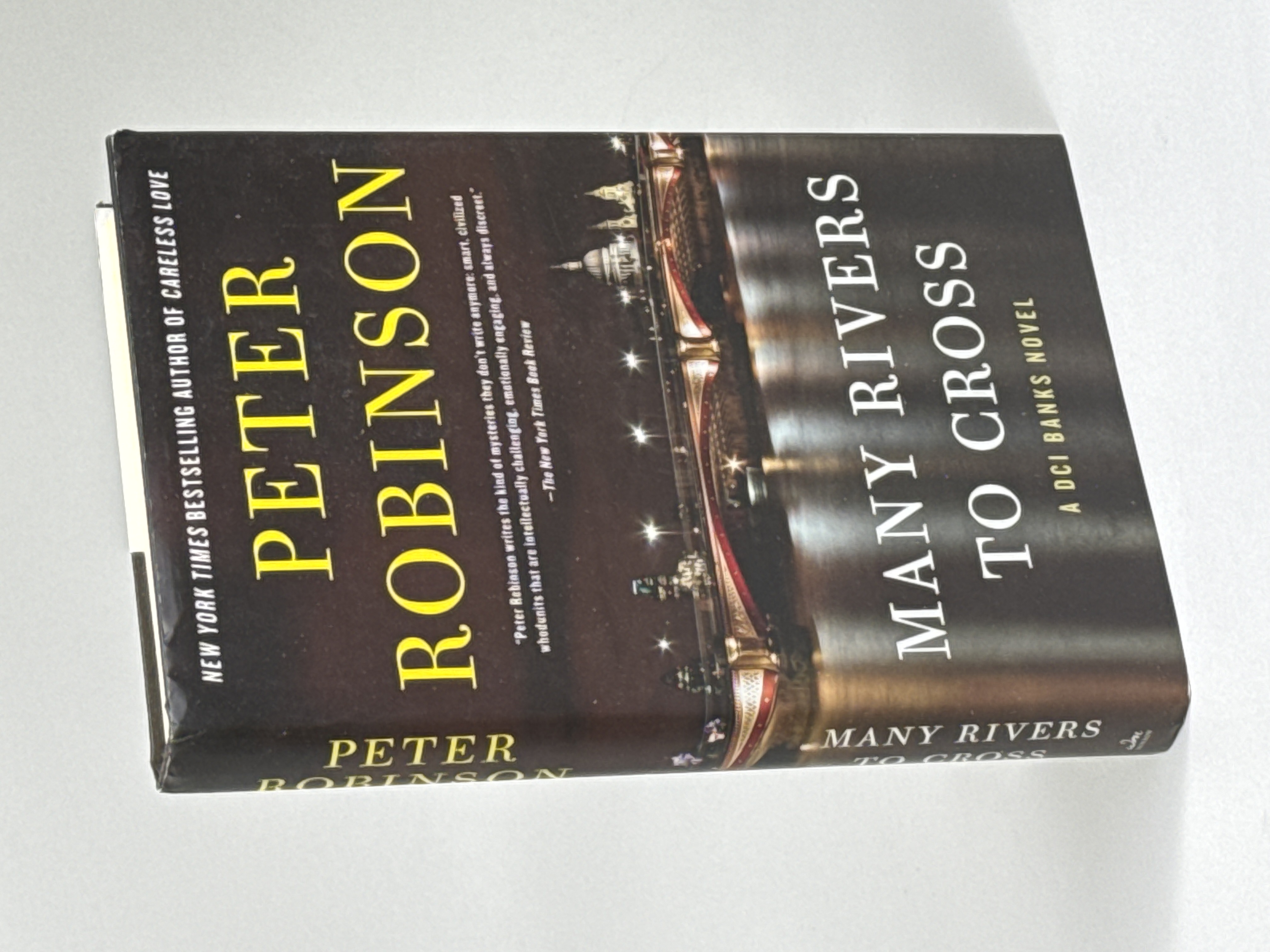 MANY RIVERS TO CROSS. by Robinson, Peter (1950-2022): NEAR FINE (2020 ...