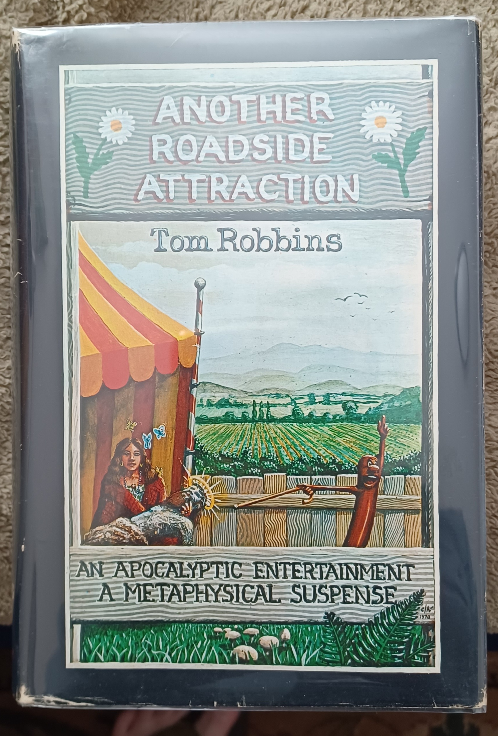 Another Roadside Attraction by Tom Robbins: Very Good Hardcover (1971) 1st Edition | Dickens Alley