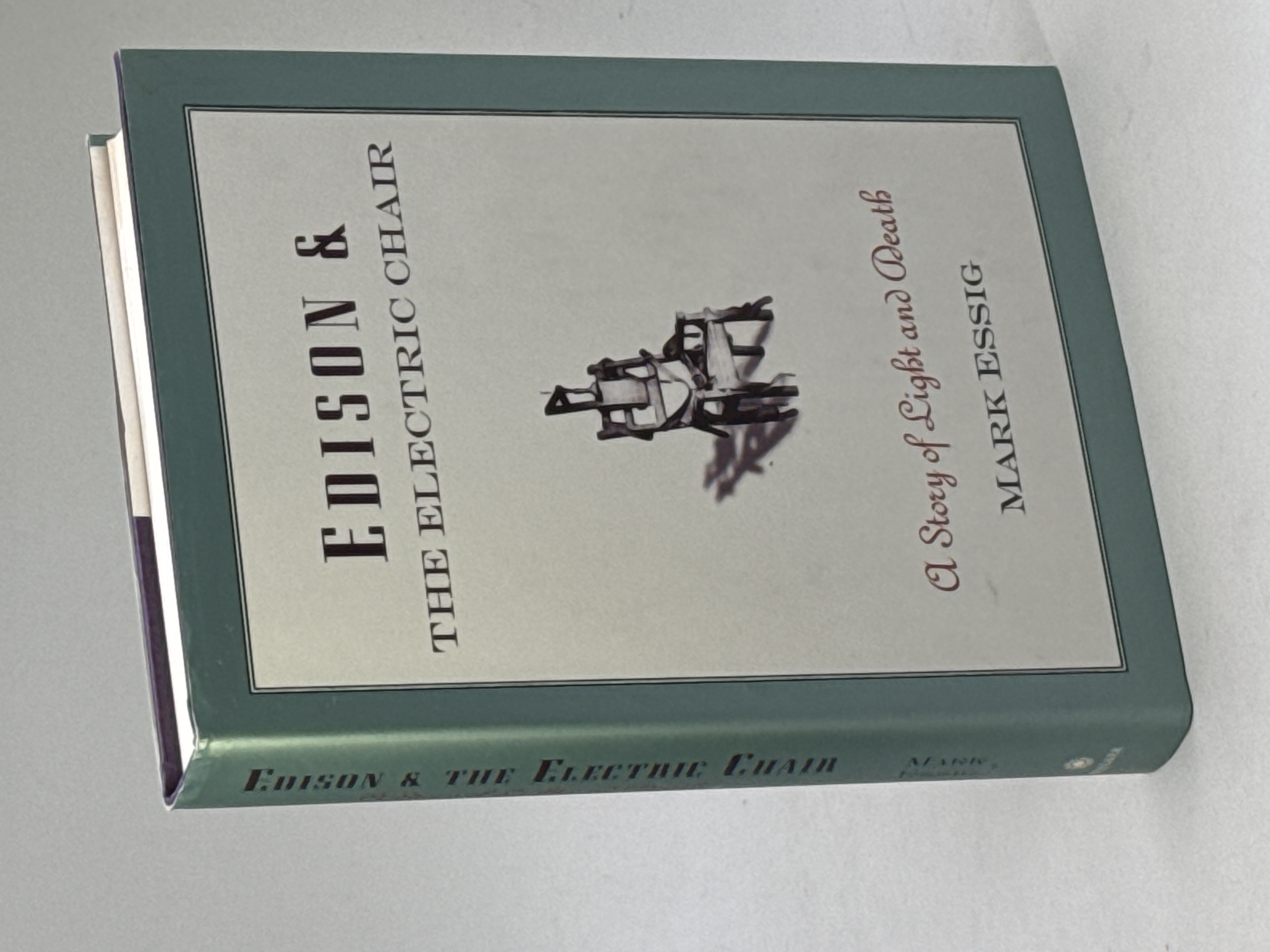 EDISON AND THE ELECTRIC CHAIR: A Story of Light and Death. von Essig, Mark: FINE (2003) Signatur ...