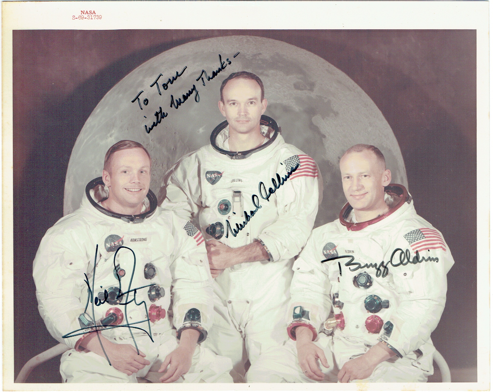An official NASA red number photograph signed and inscribed by all ...